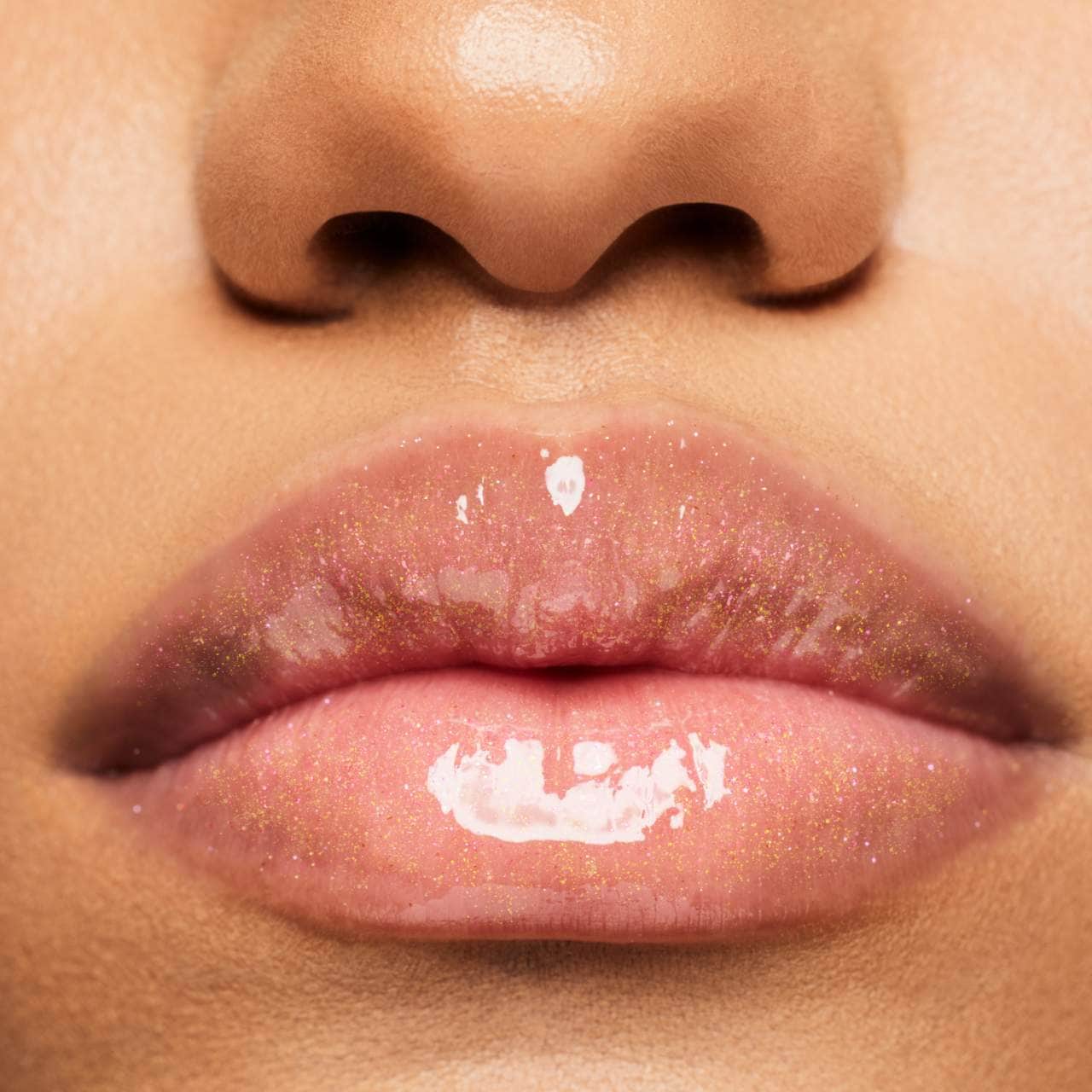 Fenty Beauty X Arcane – Gloss Bomb Universal Lip Luminizer ...